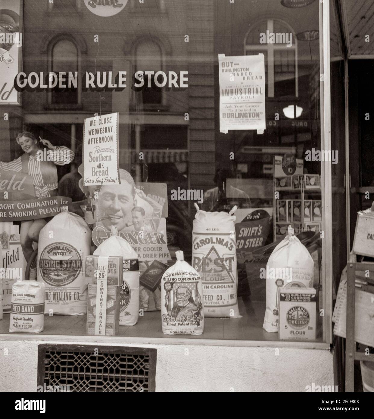 Grocery store window display. 1939. Photograph by Dorothea Lange Stock ...