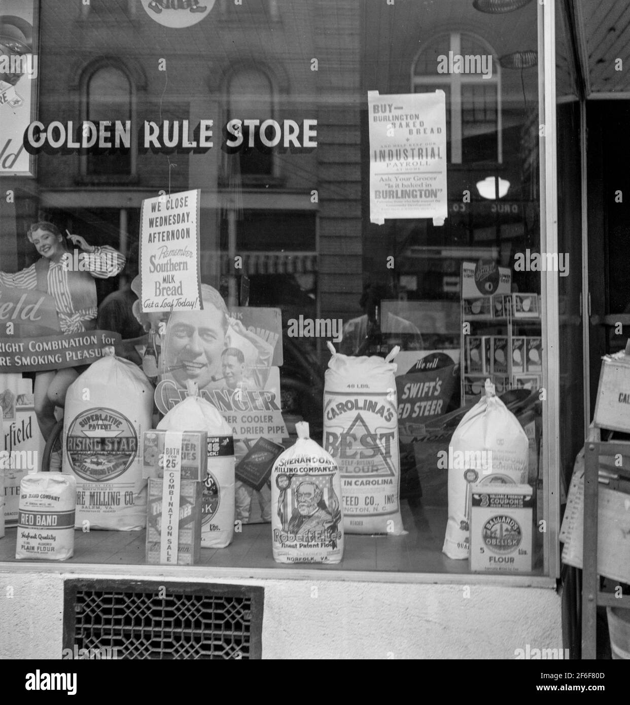Grocery store window display. 1939. Photograph by Dorothea Lange Stock ...