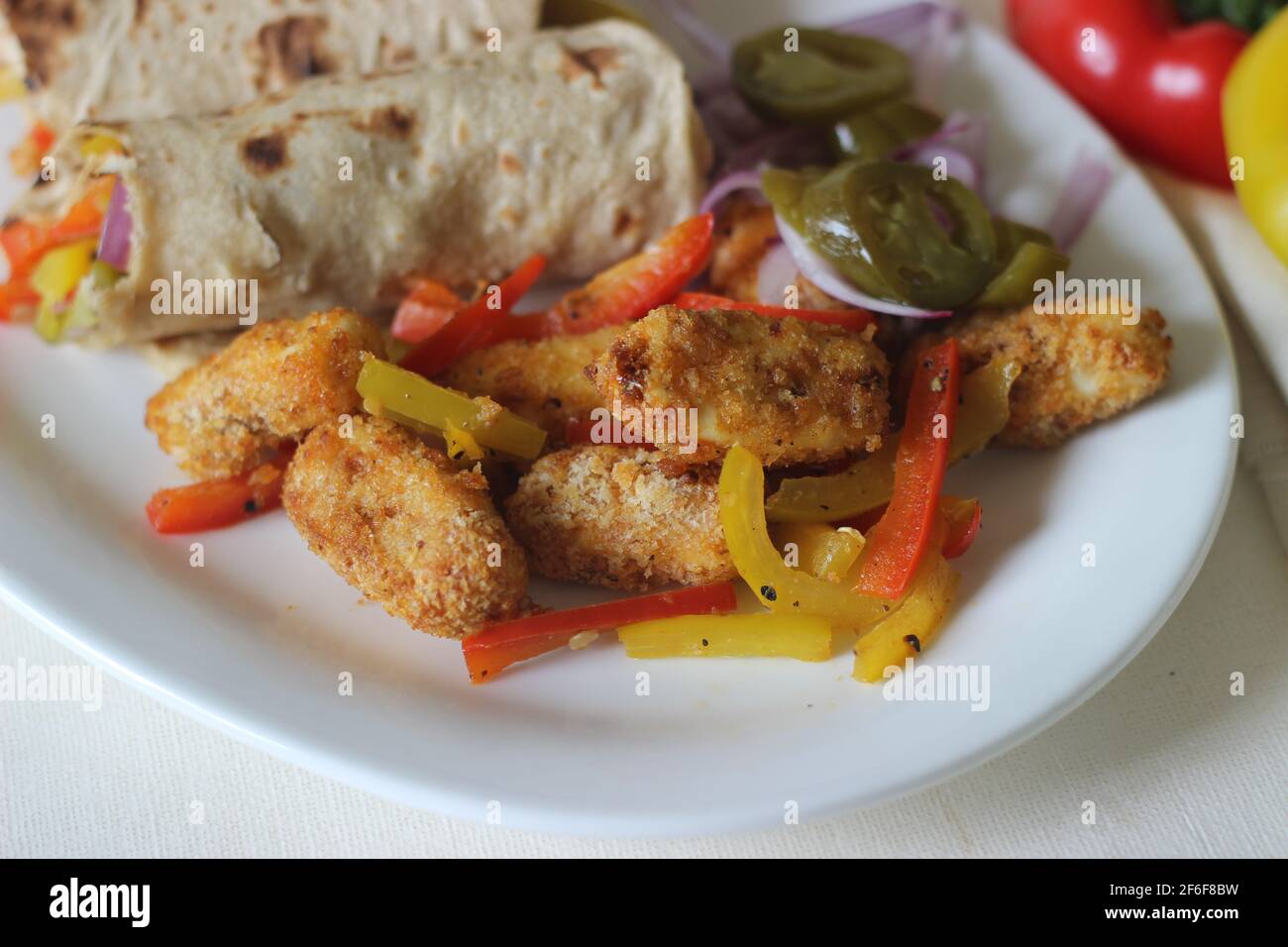 Paneer bell pepper rolls. Breaded and air fried cottage cheese, sauteed ...