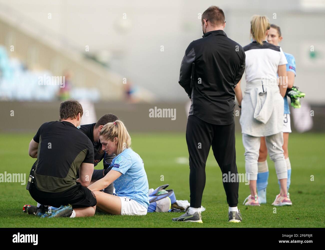 Manchester City's Laura Coombs receives treatment for an injury after ...