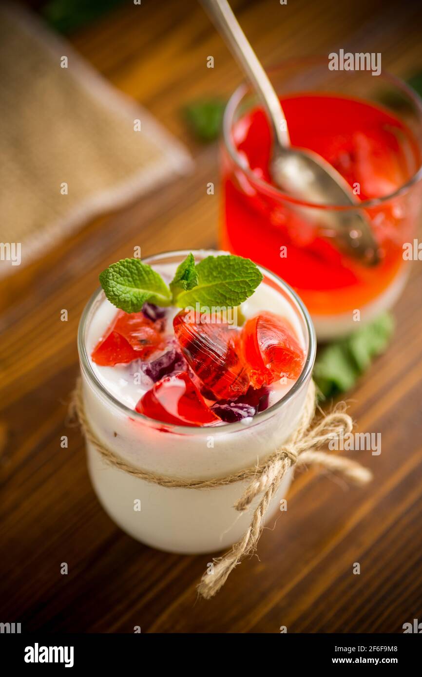 homemade sweet yogurt with fruit jelly pieces in a glass Stock Photo ...