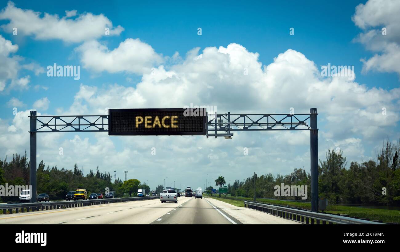 Street Sign the Direction Way to Peace Stock Photo - Alamy