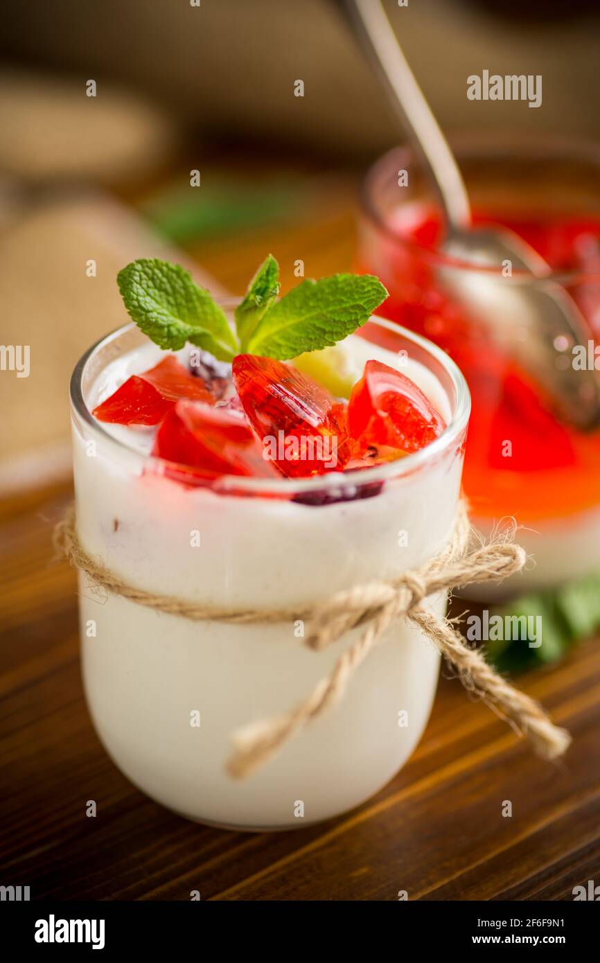 homemade sweet yogurt with fruit jelly pieces in a glass Stock Photo ...