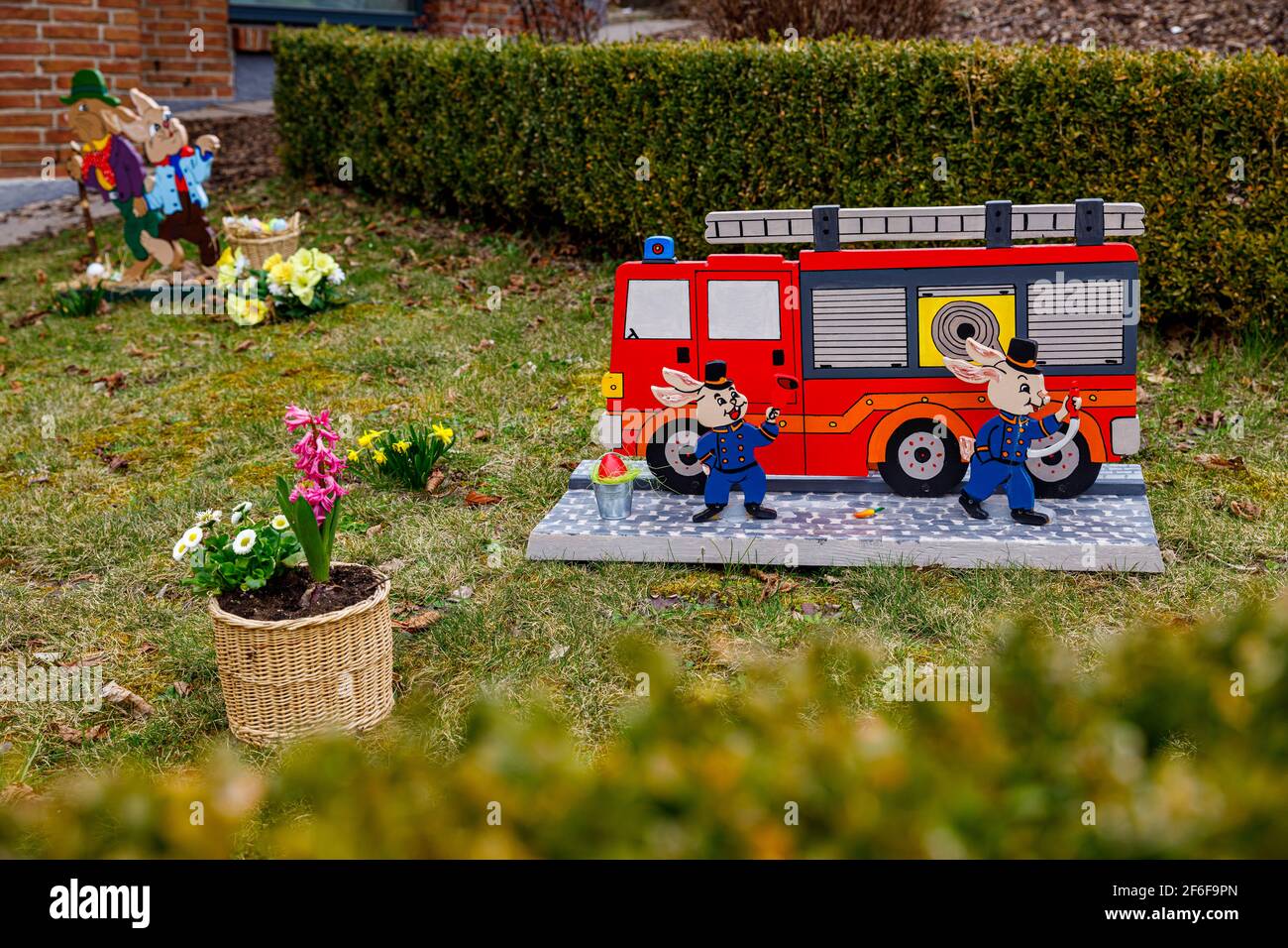 Easter Bunny with a fire engine at the Easter Bunny Trail of ...