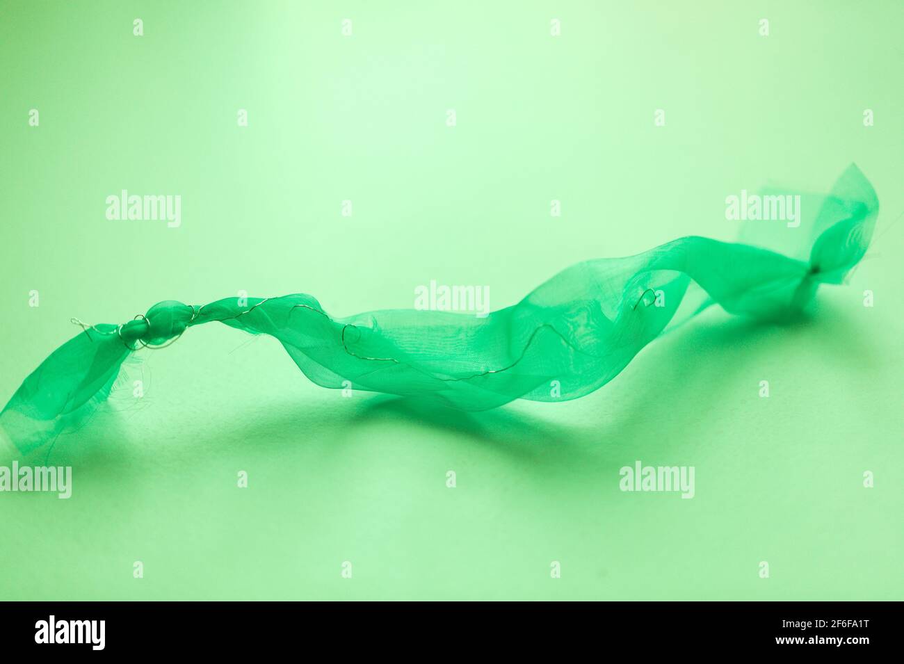 Spiral -Texture - Green Tulle Fabric on a green background Stock Photo ...