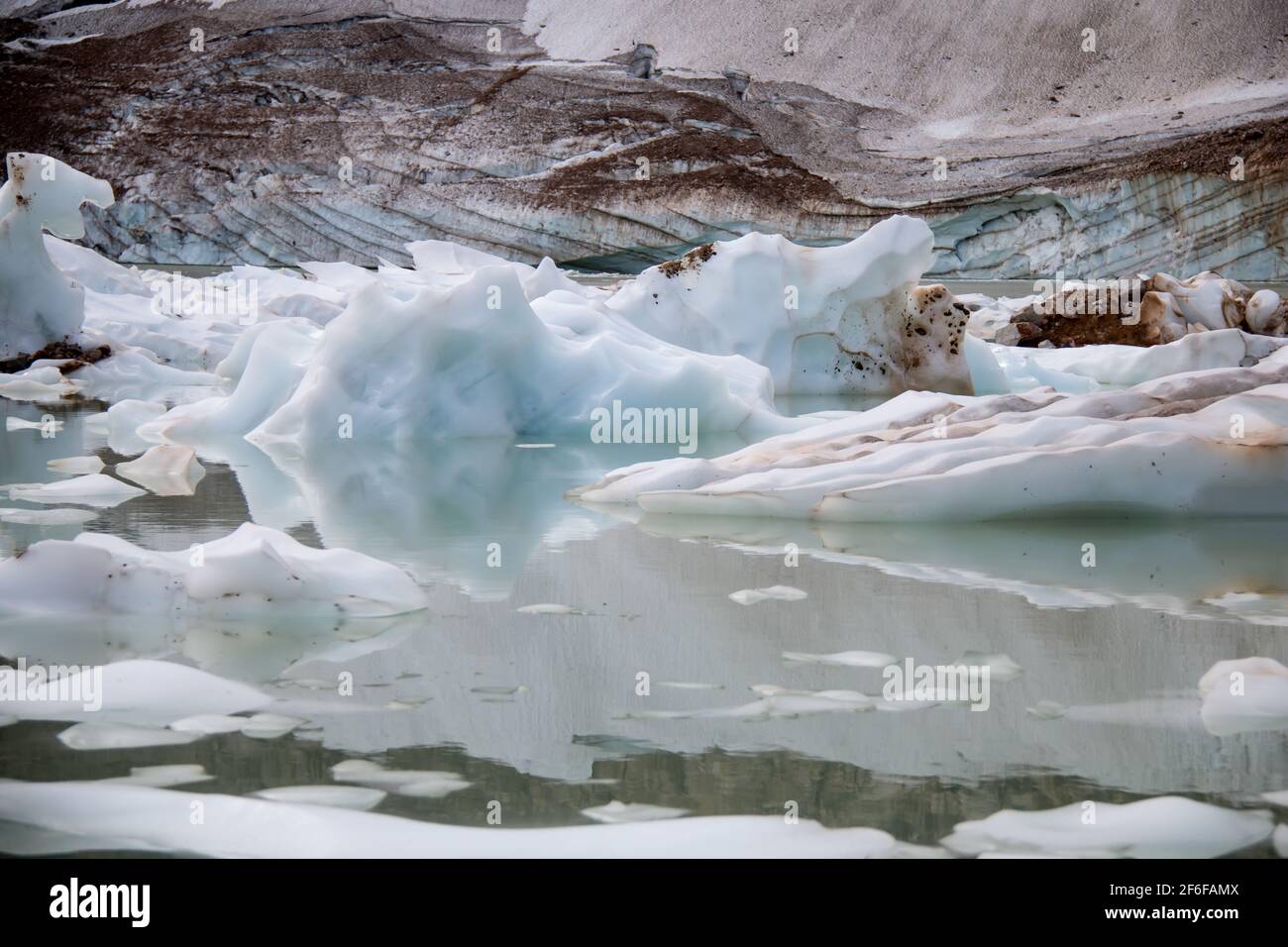 Small icebergs floating in a glacier-fed pool at the bottom of Angel ...