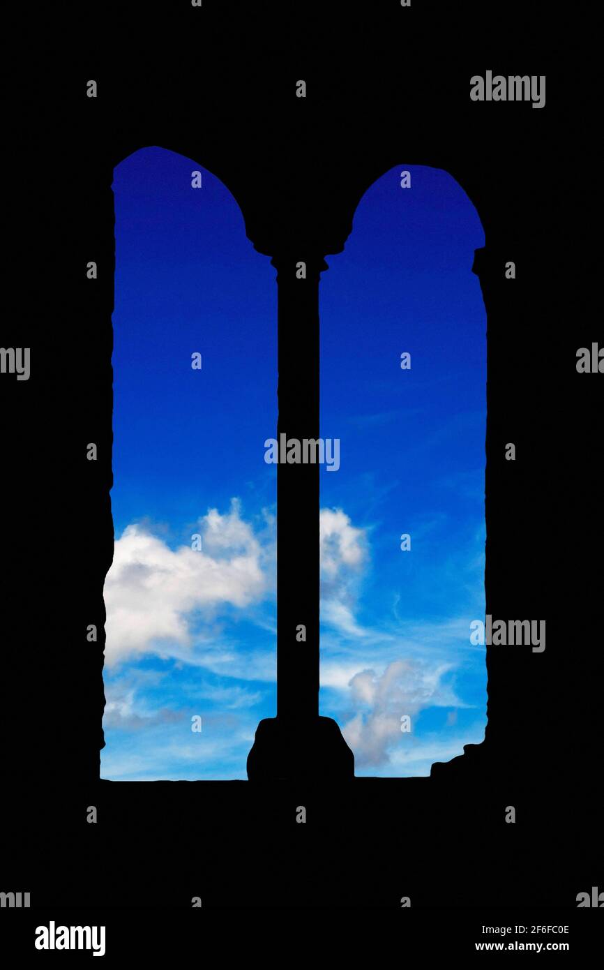 arched window with blue sky behind it Stock Photo - Alamy