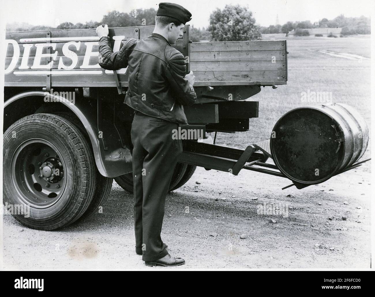 Loading ojetrumpa to truck using backboard lift Stock Photo - Alamy