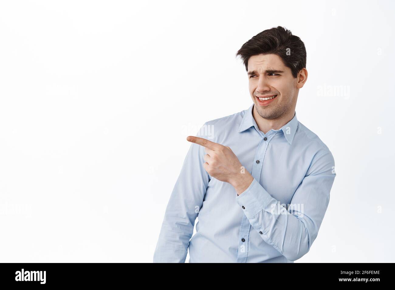 Skeptical and doubtful office manager, businessman staring and pointing ...