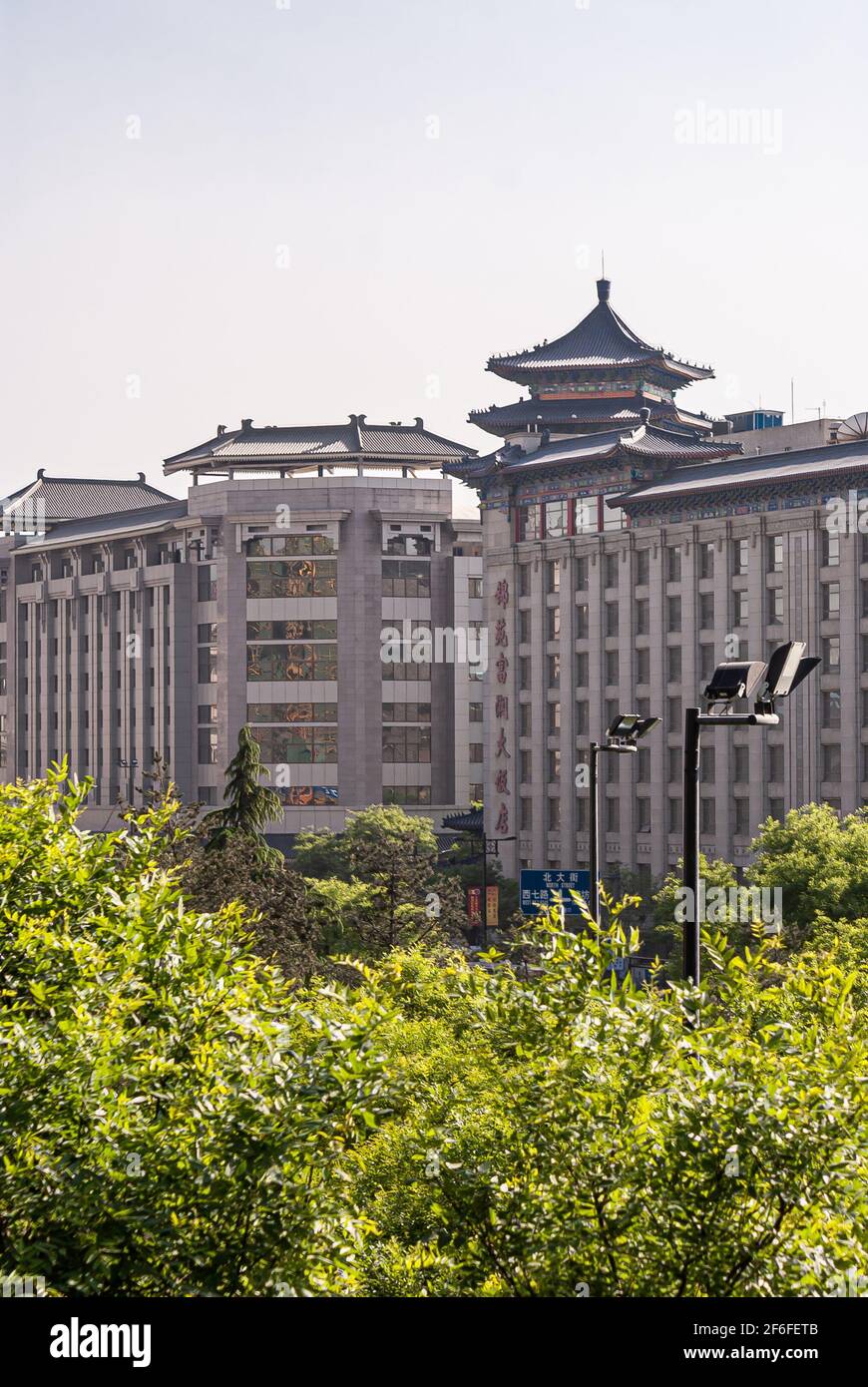 Xian, China - April 30, 2010: gray stone tall buildings with Chinese ...