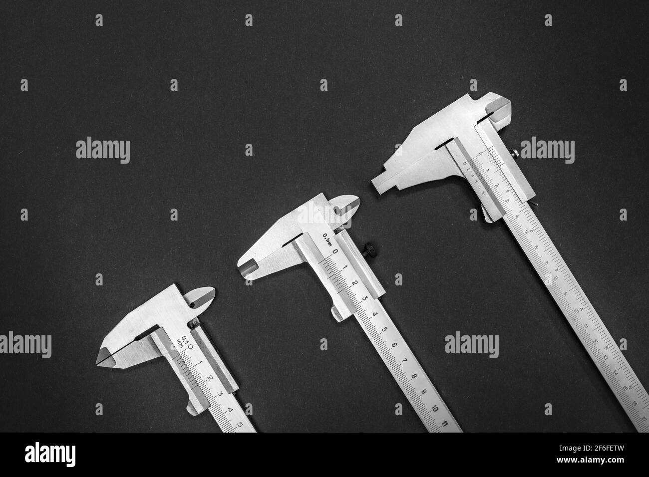 Vernier caliper three types on dark grey-black patterns background ...