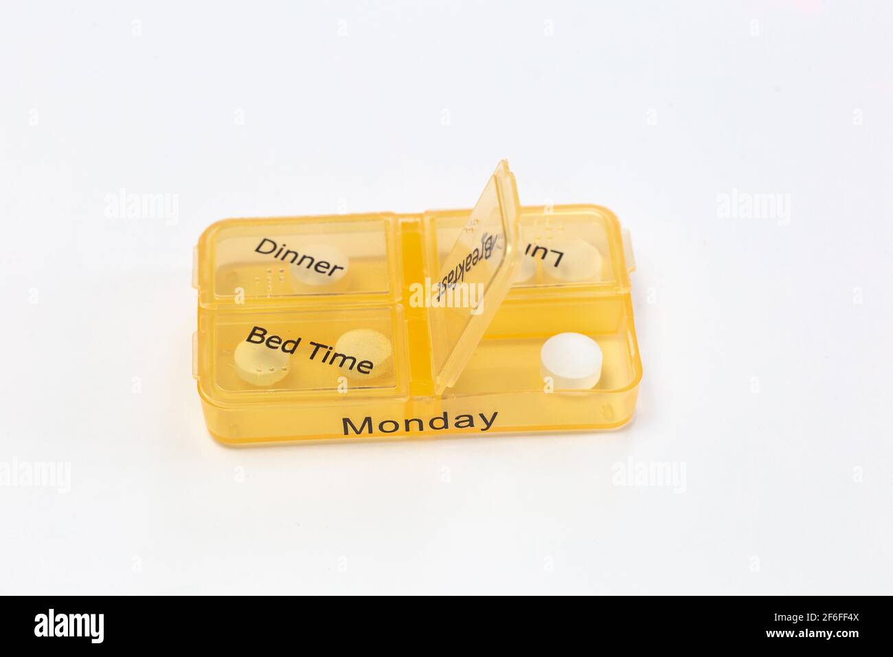 Hands of human with pill reminder box, taking medication isolated on ...