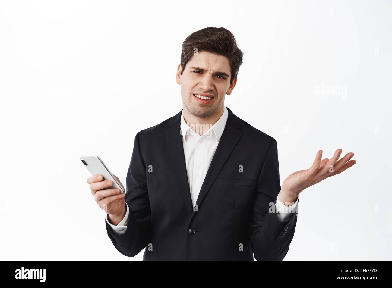 Businessman Shrugging Shoulders High Resolution Stock Photography and ...