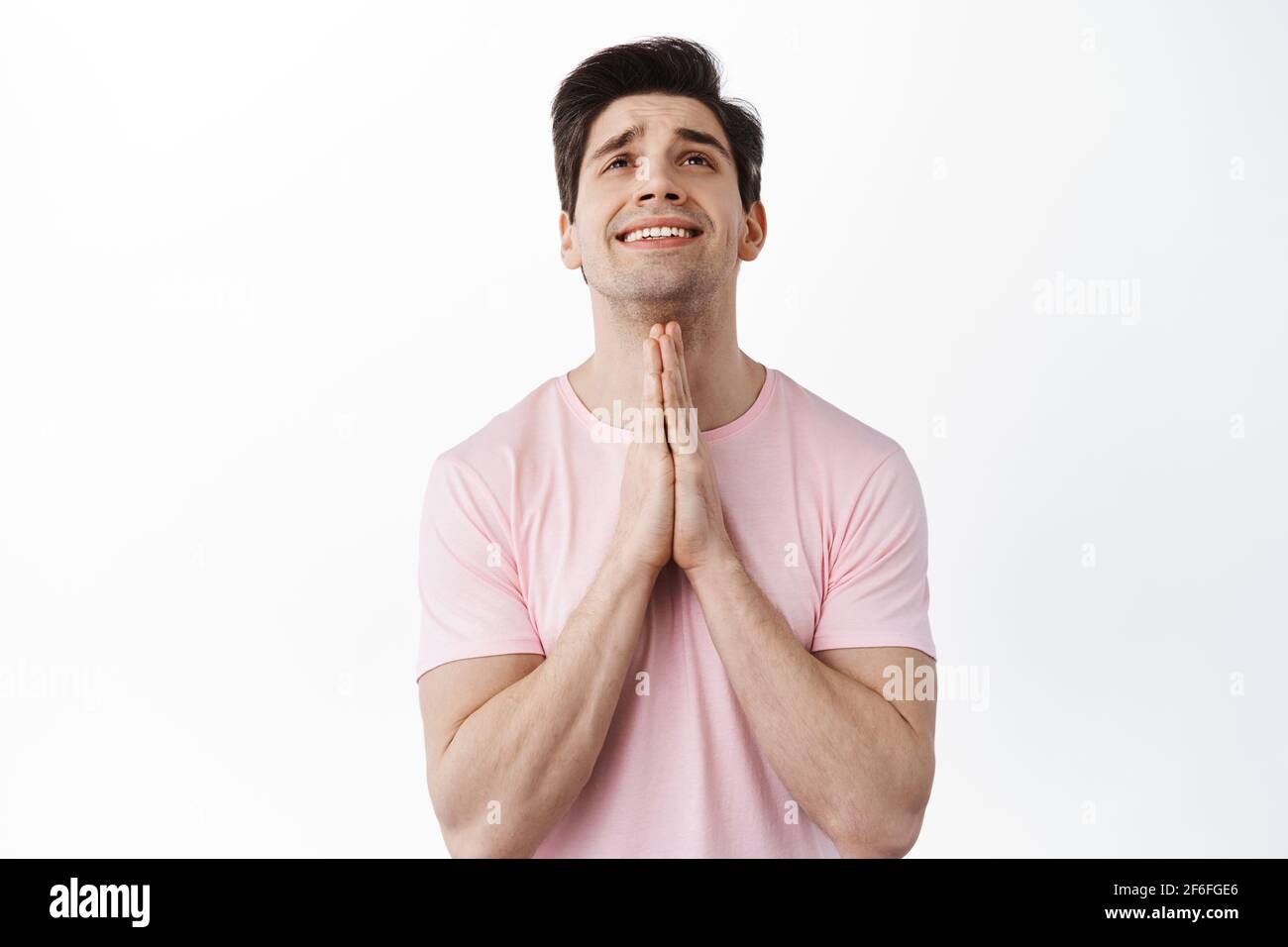 Please god help. Desperate young man begging Lord, look up in sky and ...