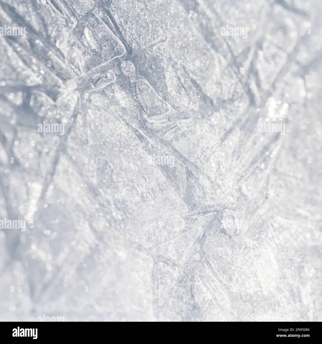 In the sun glisten Transparent ice crystals texture cracked background ...