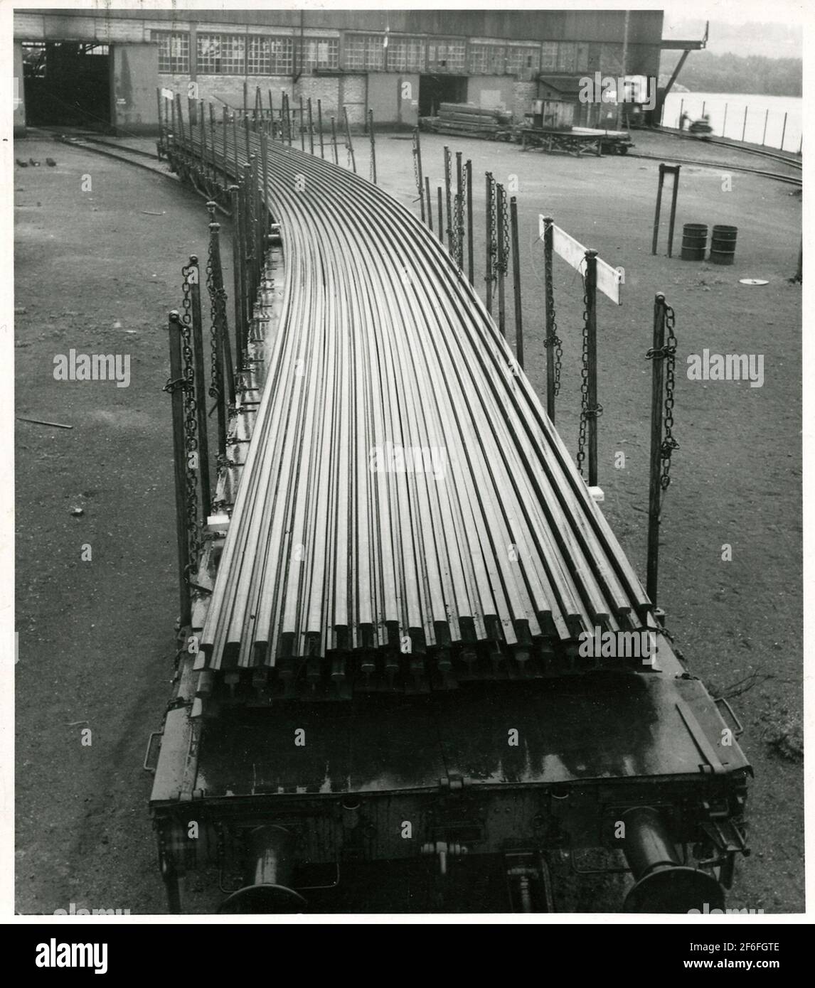 Rails loaded on the freight cart for transport Stock Photo - Alamy