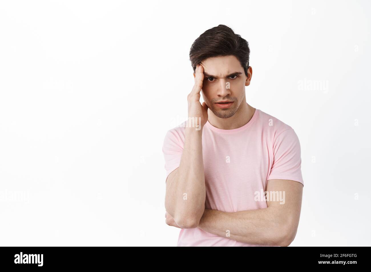 Annoyed confused man frowning, staring irratated at camera, cant ...