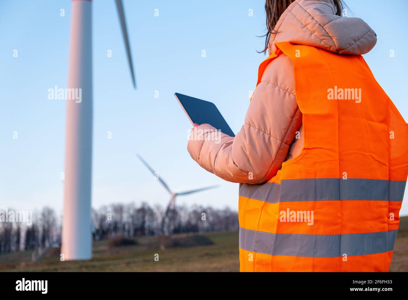 Engineer does maintenance and repairs wind wills or wind turbine using ...