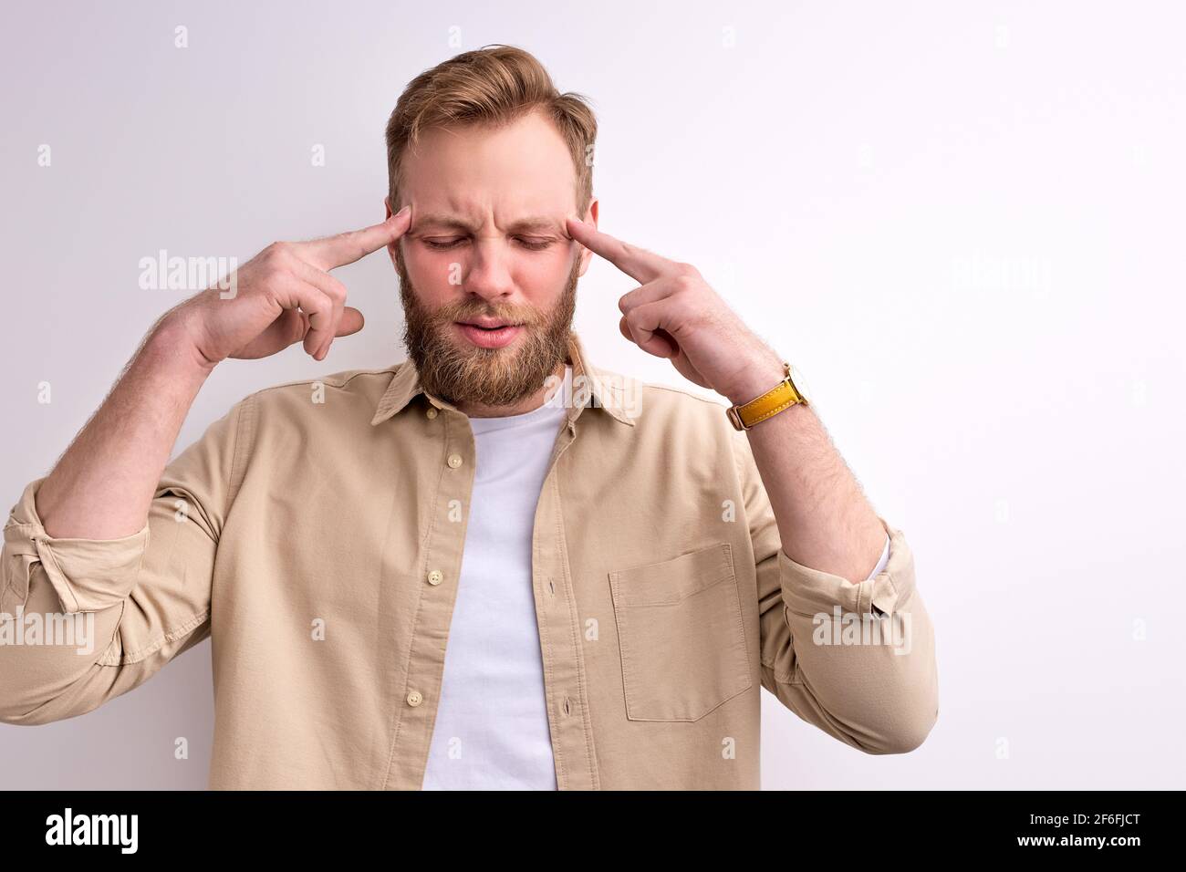 let's me think. man holding fingers on temples, try to remember ...