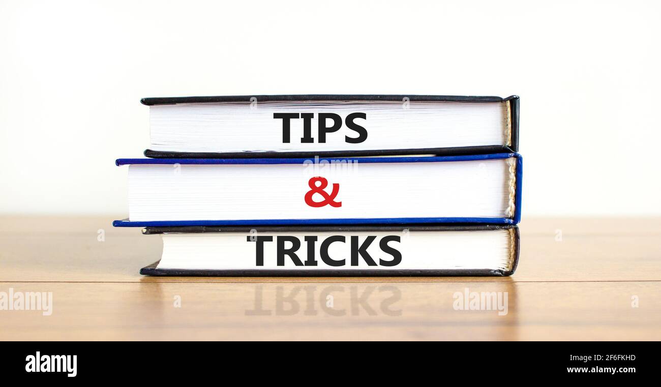Tips and tricks symbol. Books with words 'Tips and tricks'. Beautiful ...