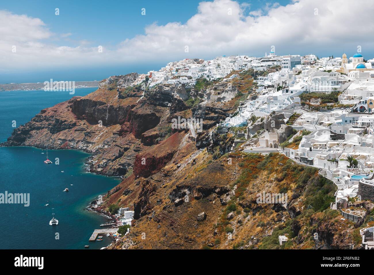 Panoramic view of Oia , a small village on the edge of the caldera, by ...