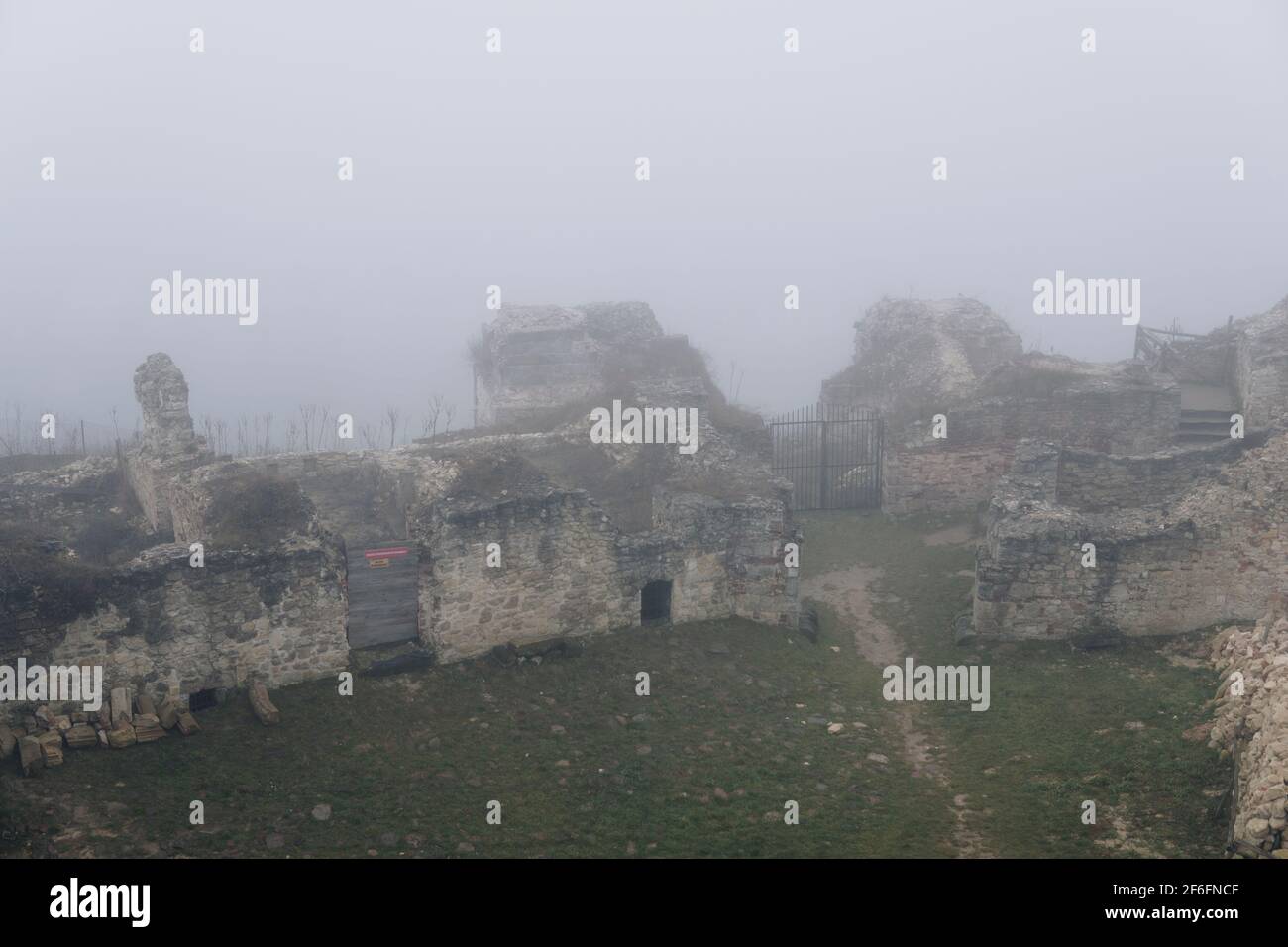 old medieval castle ruins in city of Ilza in Poland partially covered ...
