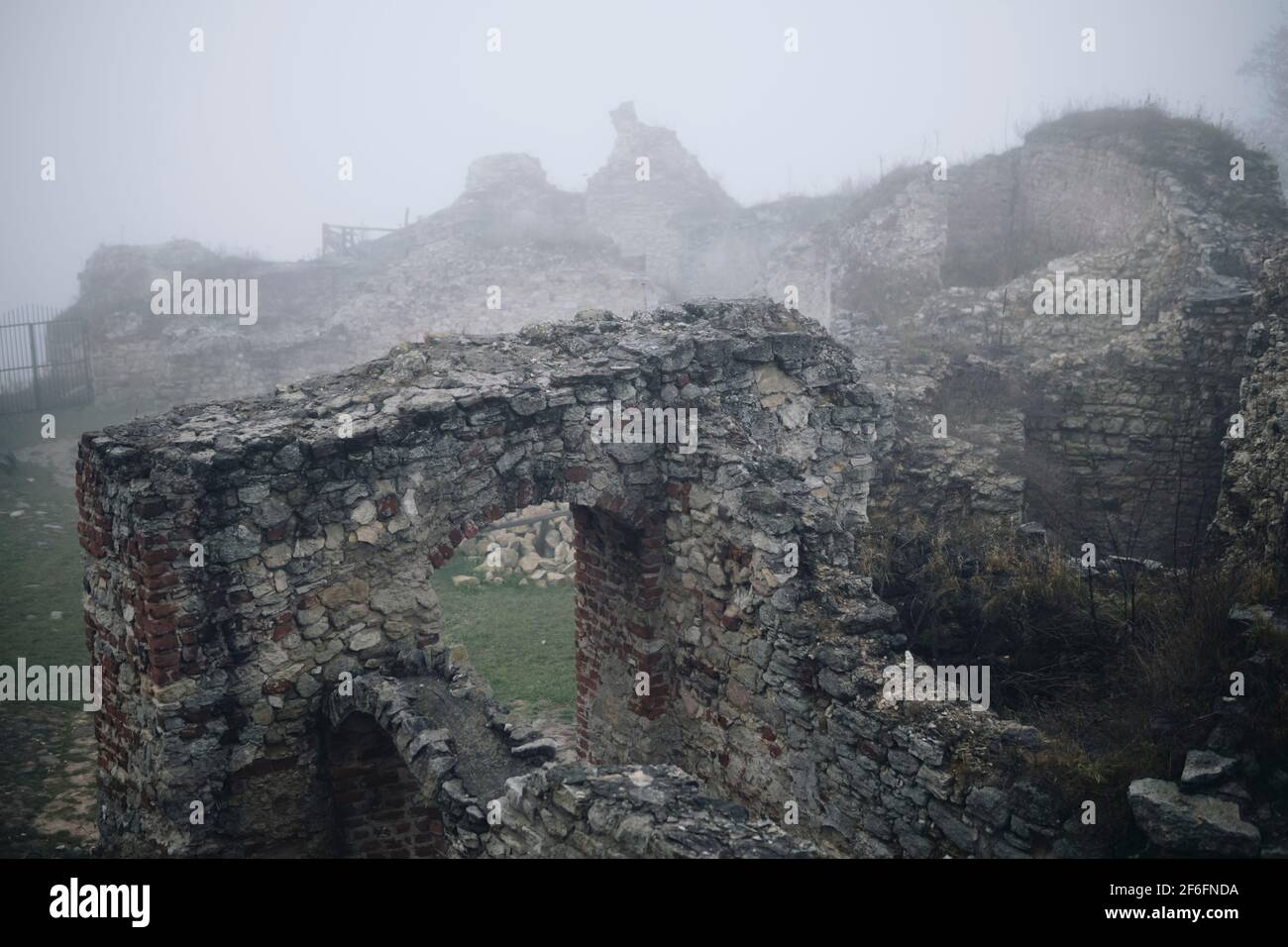 old medieval castle ruins in city of Ilza in Poland partially covered ...