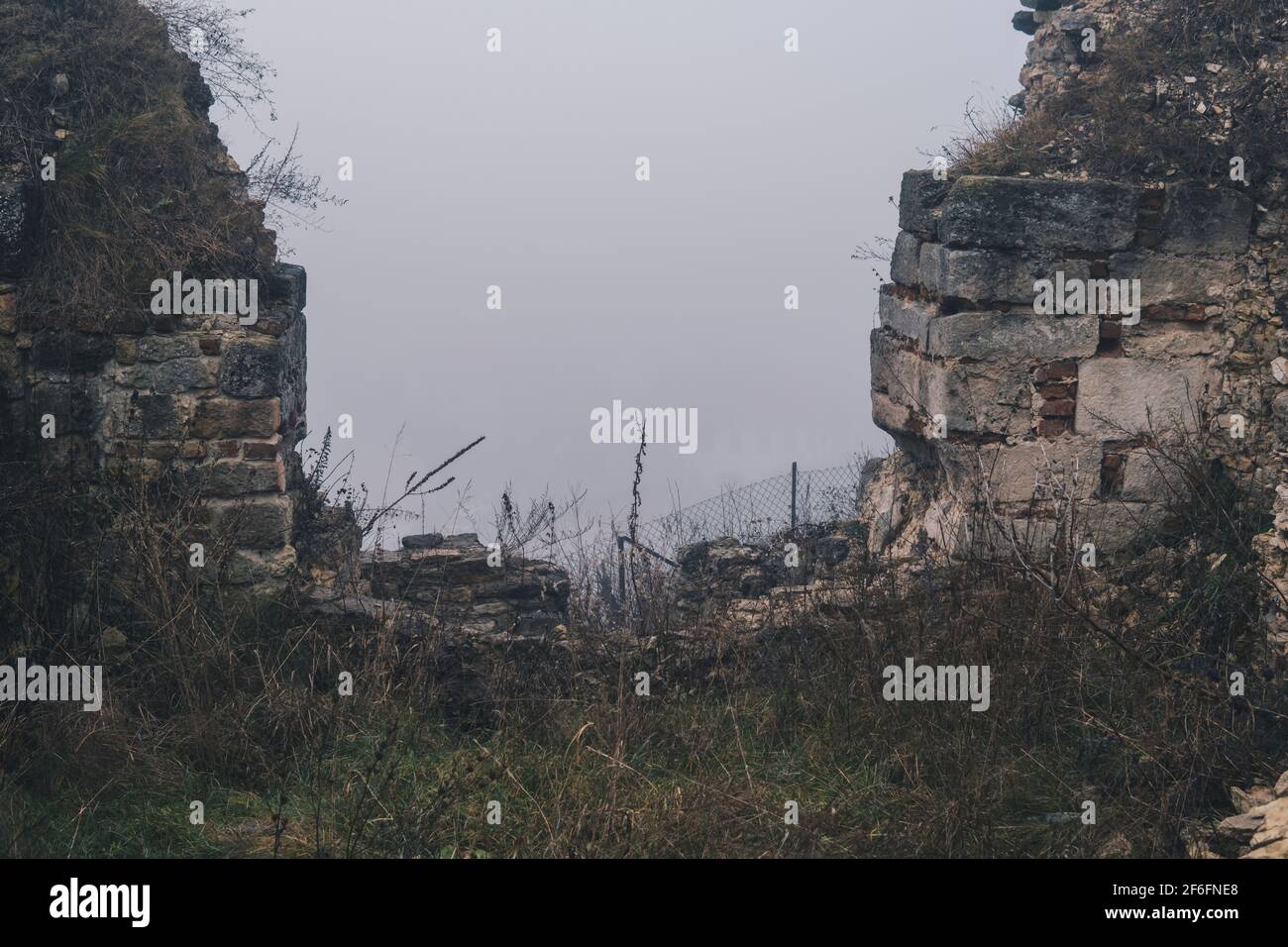 detail of hole inside of walls of old medieval castle in the city of ...