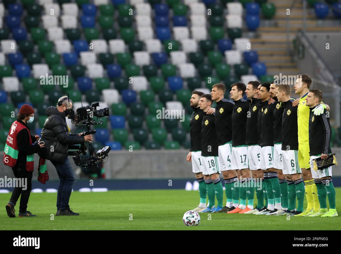 Northern Ireland players line up for the national anthem before the ...