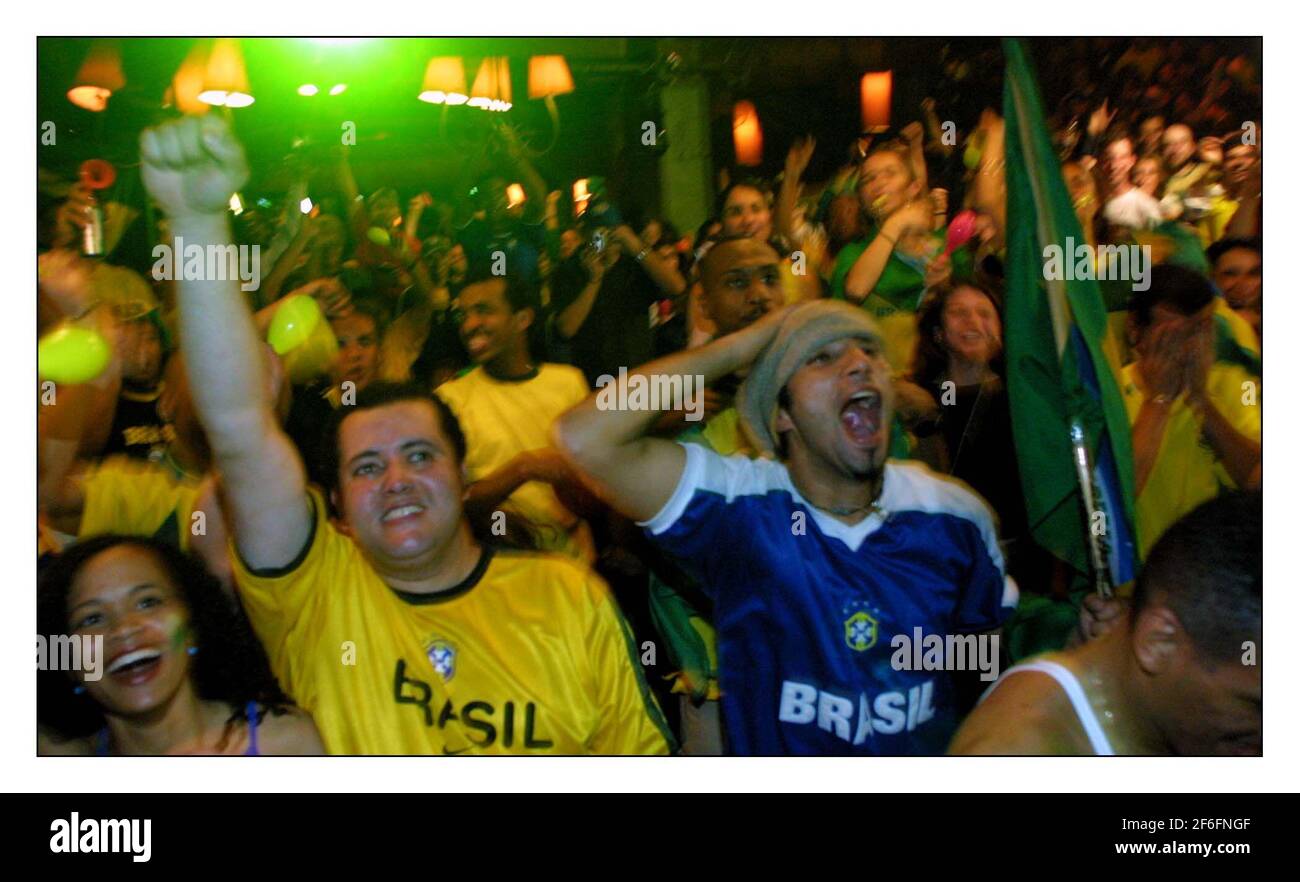 Brazil fans in Salsa Bar in London celebrate their win over England in ...