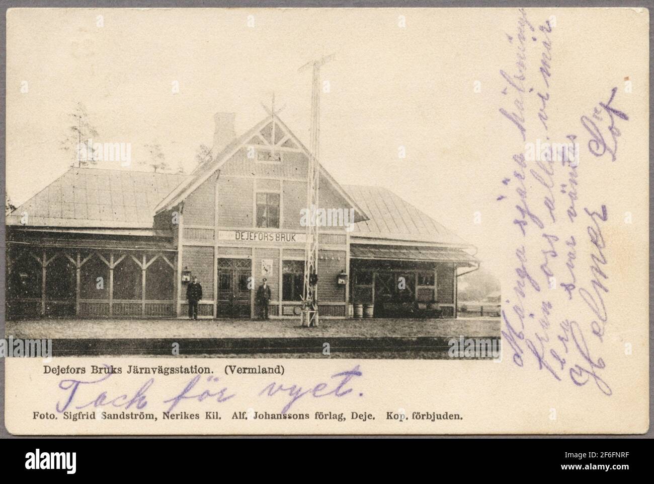 Track page of station with staff on Perrong Stock Photo - Alamy