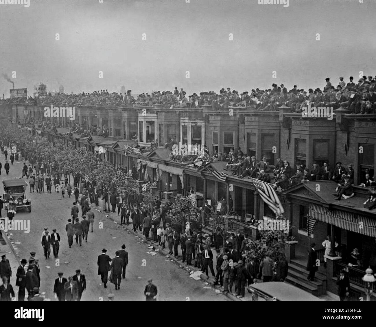 Fans on buildings outside Shibe Park, Philadelphia, during 1913 World ...