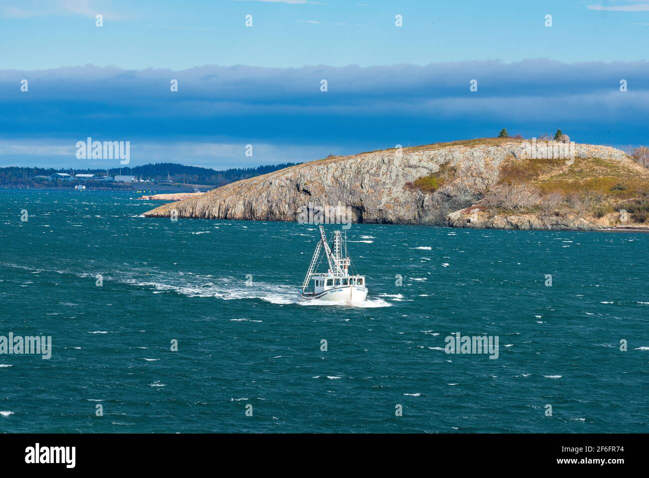 Boat returning to shore at Johnson's Bay, Lubec, Maine Stock Photo - Alamy