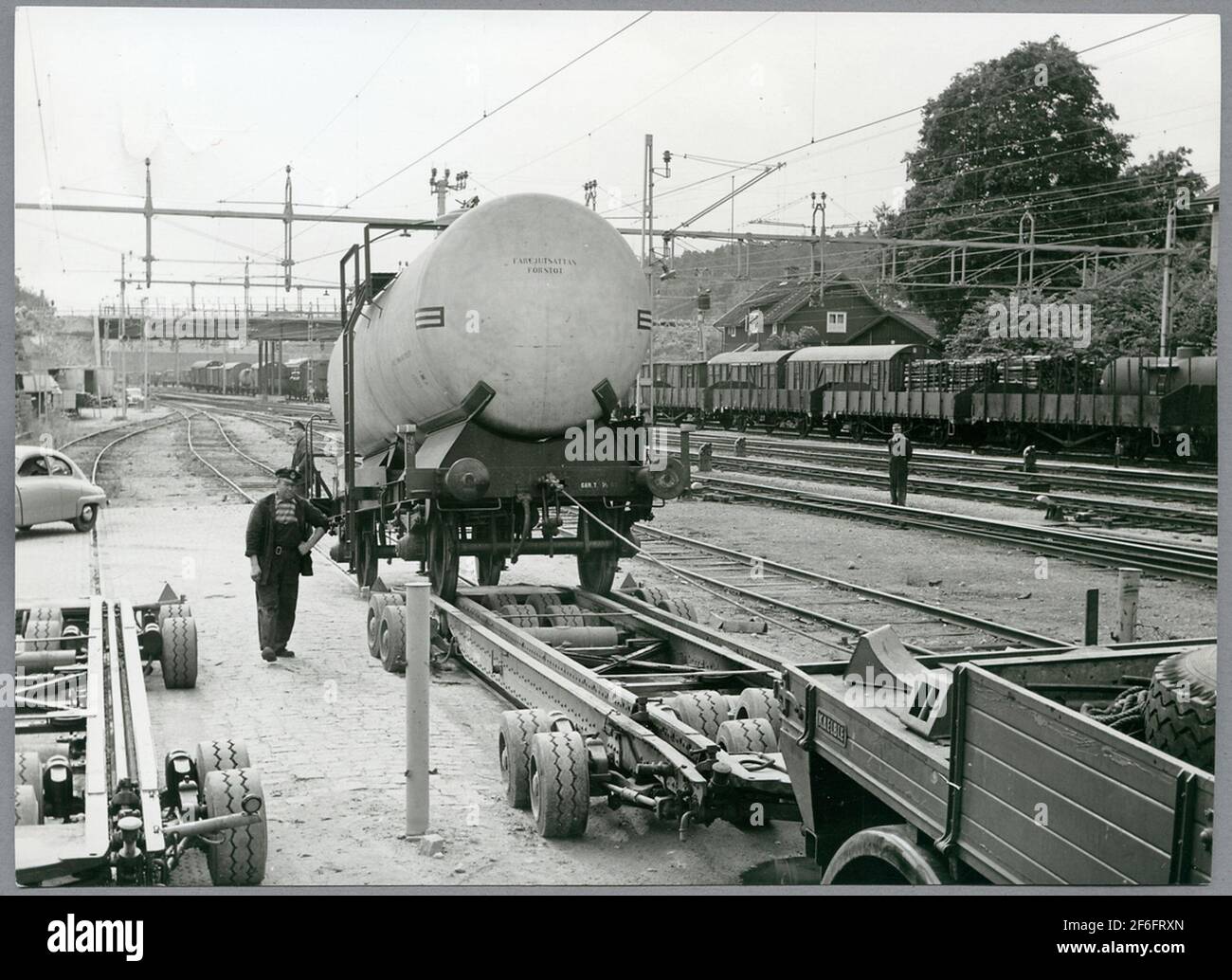 Truck with cargo bear for transporting tank wagon at Södertälje Central Station Stock Photo - Alamy