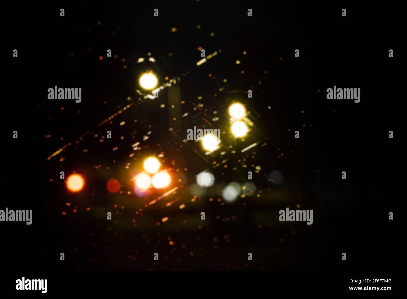 Street lights at night. Shot through a car window, With s blurred ...