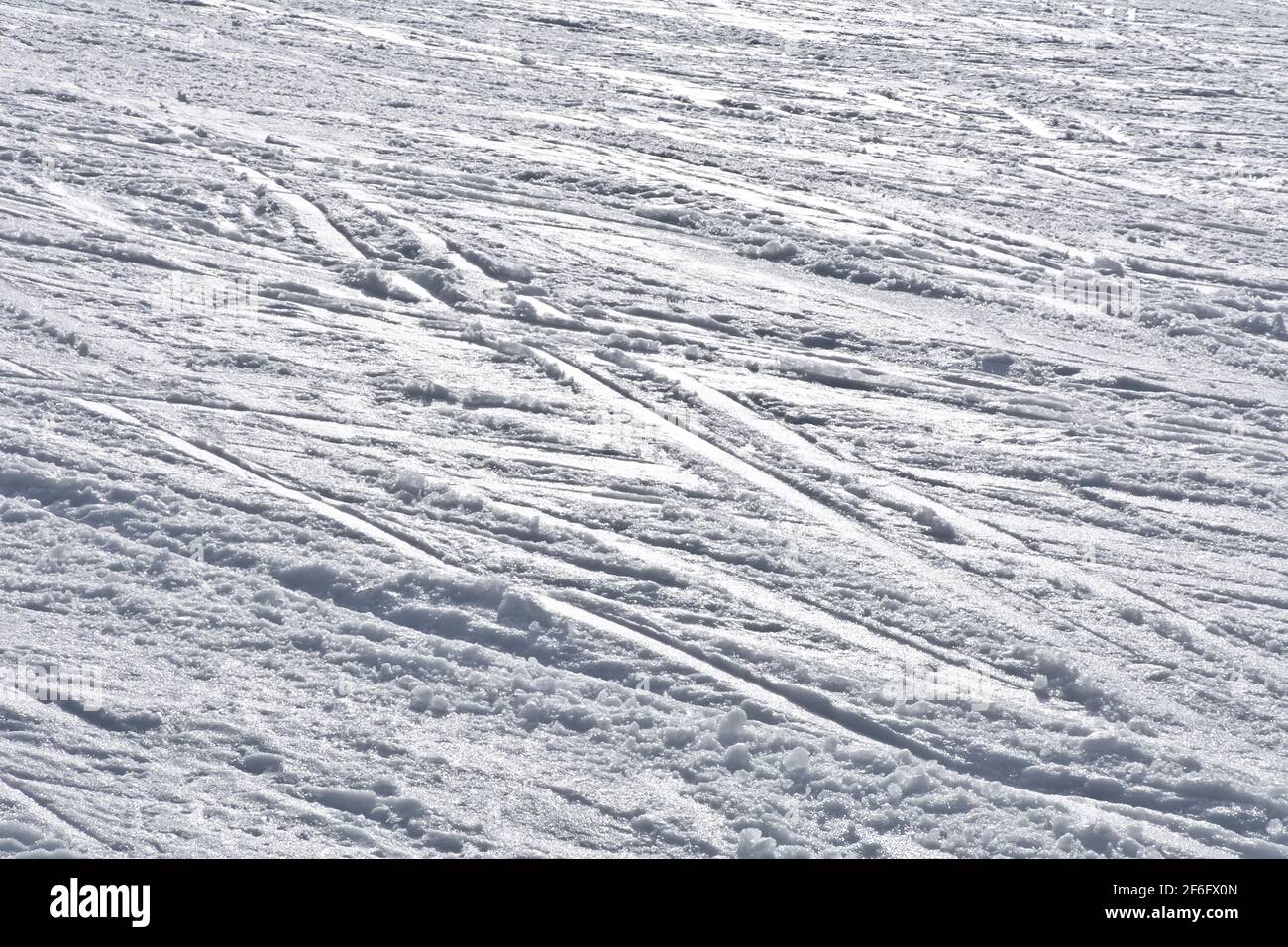 Ski traces in the snow Stock Photo - Alamy