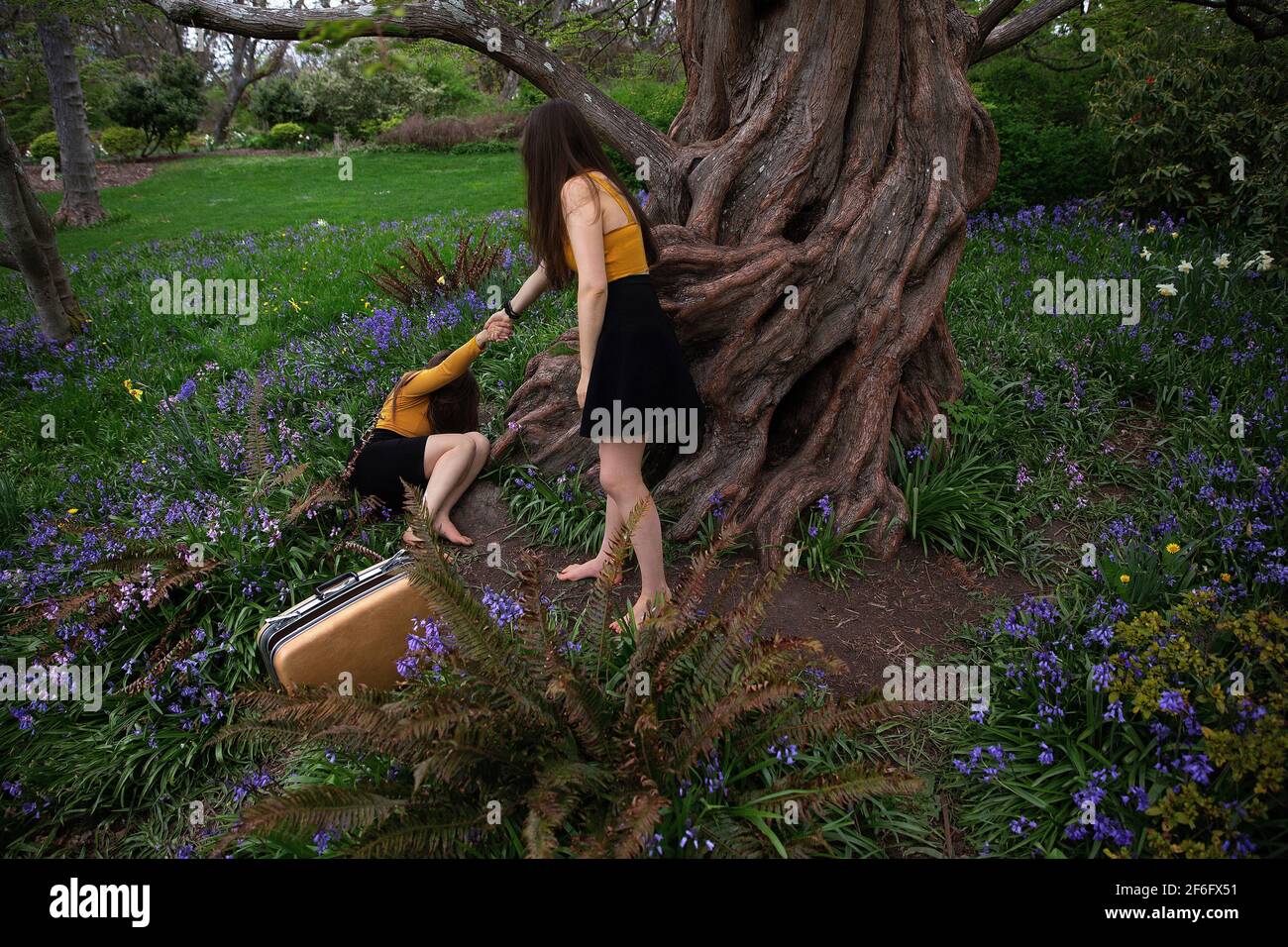 Helping friend ground hi-res stock photography and images - Alamy