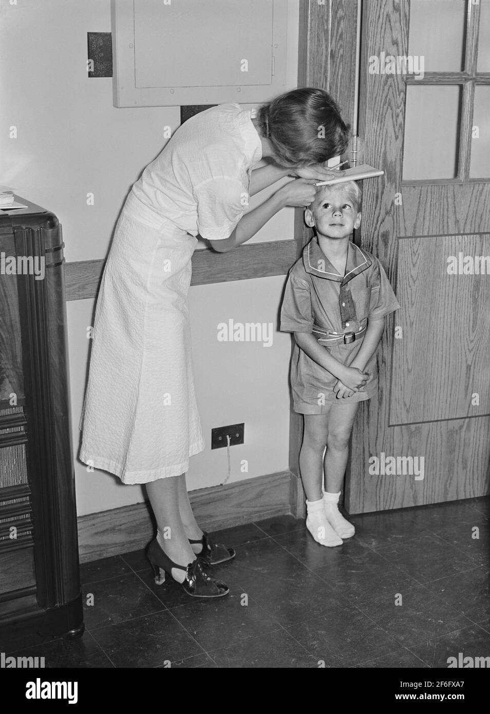 School nurse examination boy Black and White Stock Photos & Images - Alamy