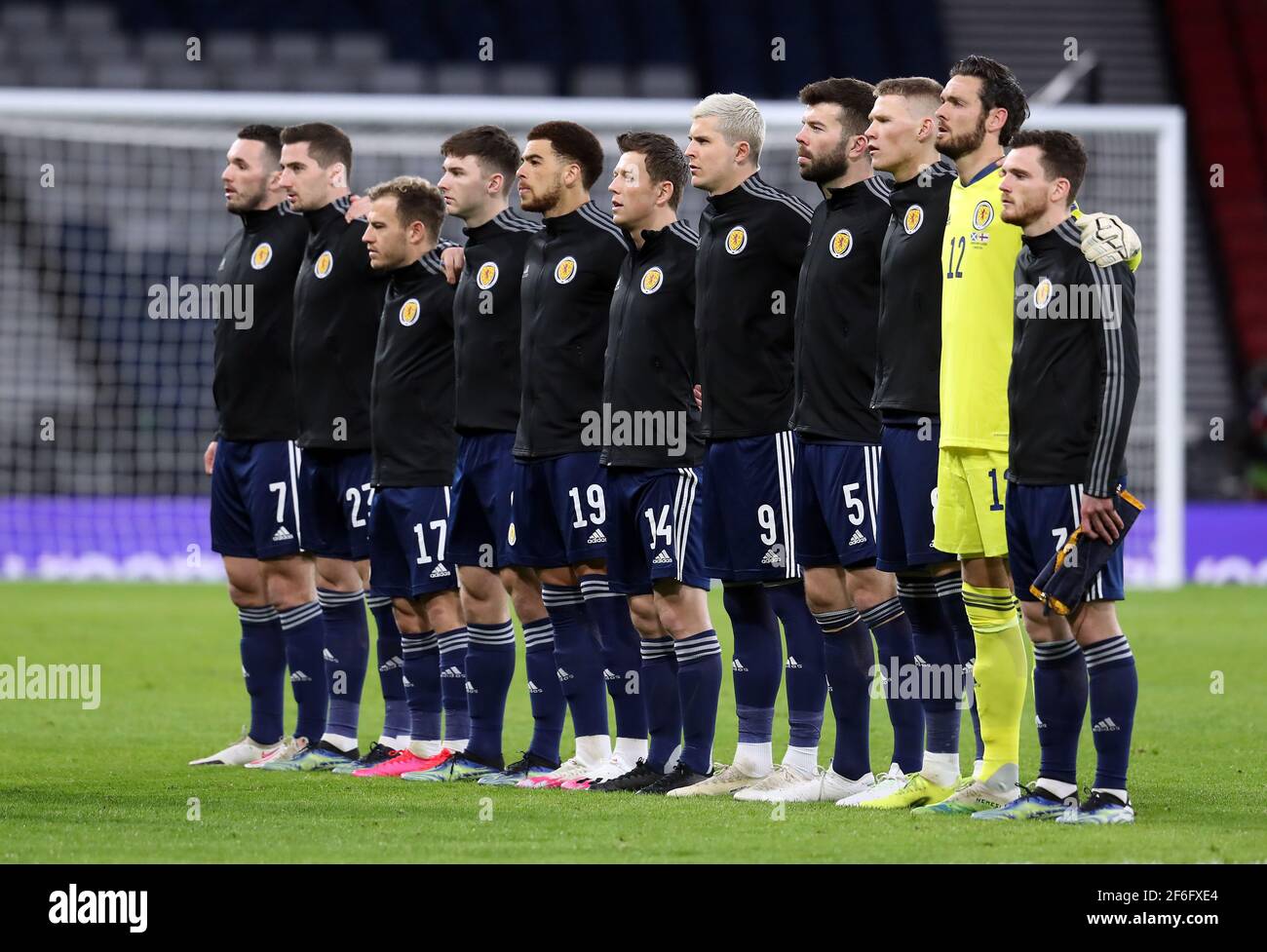 Scotland's (left to right) John McGinn, Kenny McLean, Ryan Fraser ...