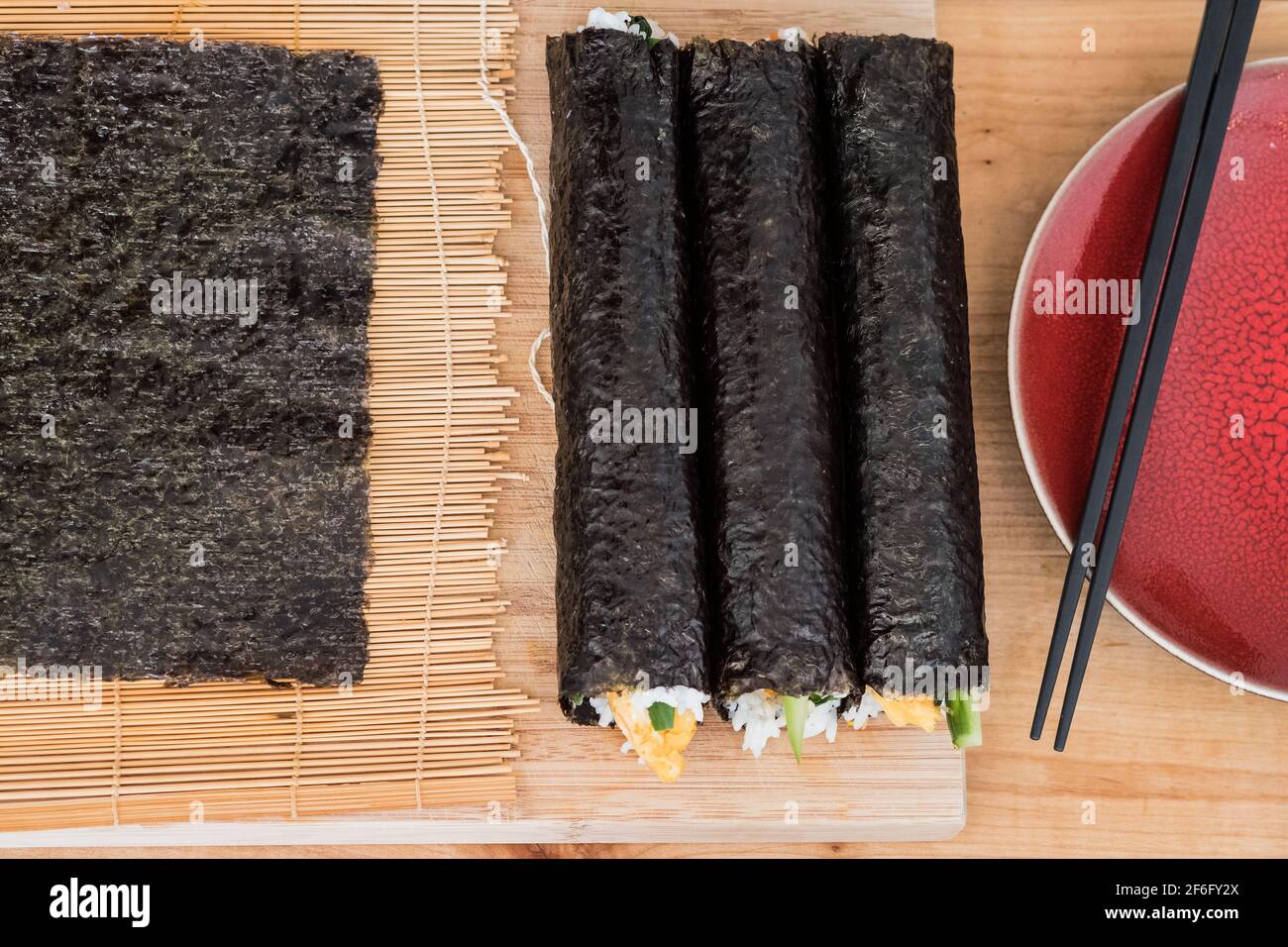 Korean gimbap rools fresh prepared before cutting Stock Photo - Alamy