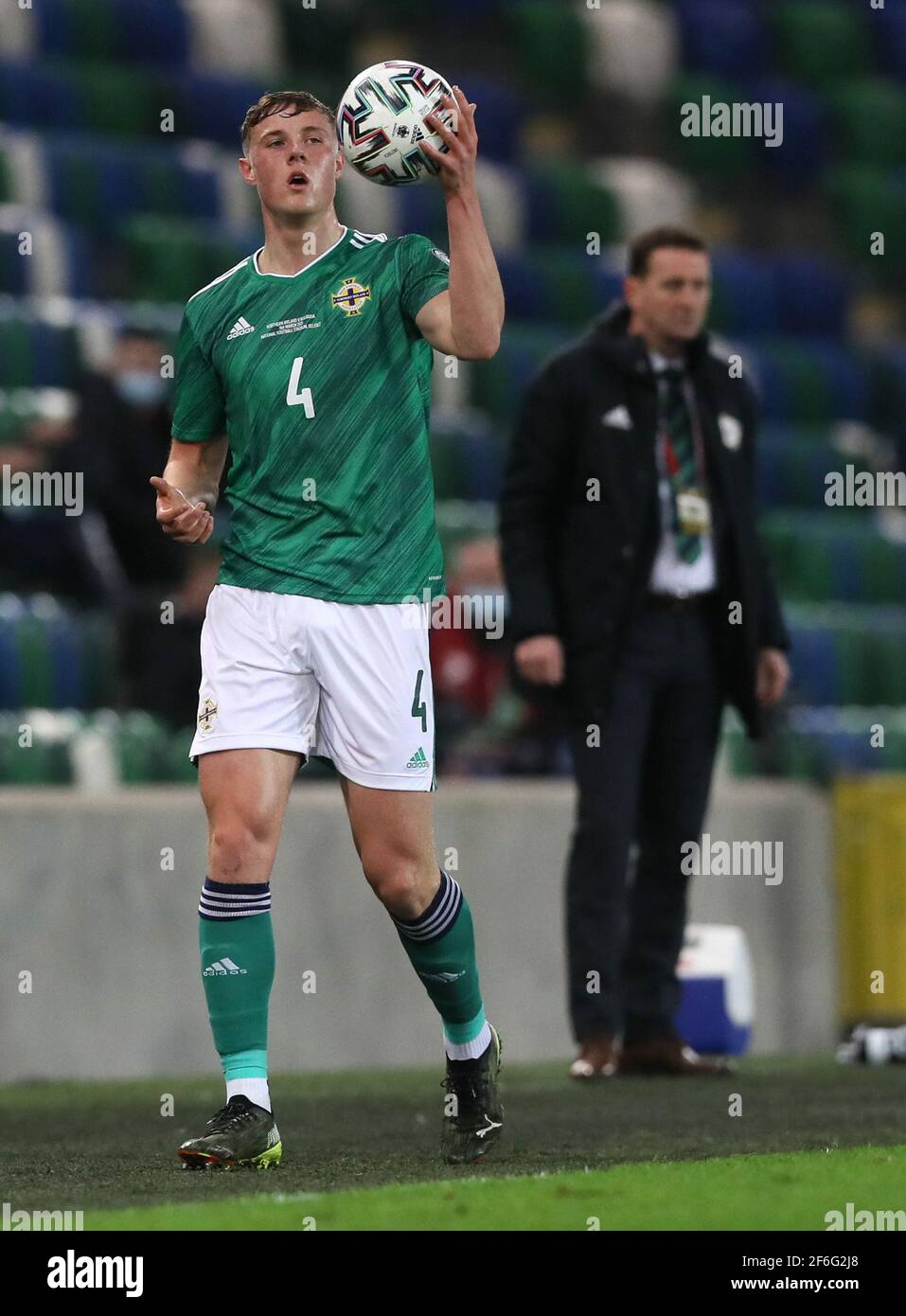 Northern Ireland's Danny Ballard (left) takes a throw-in during the ...