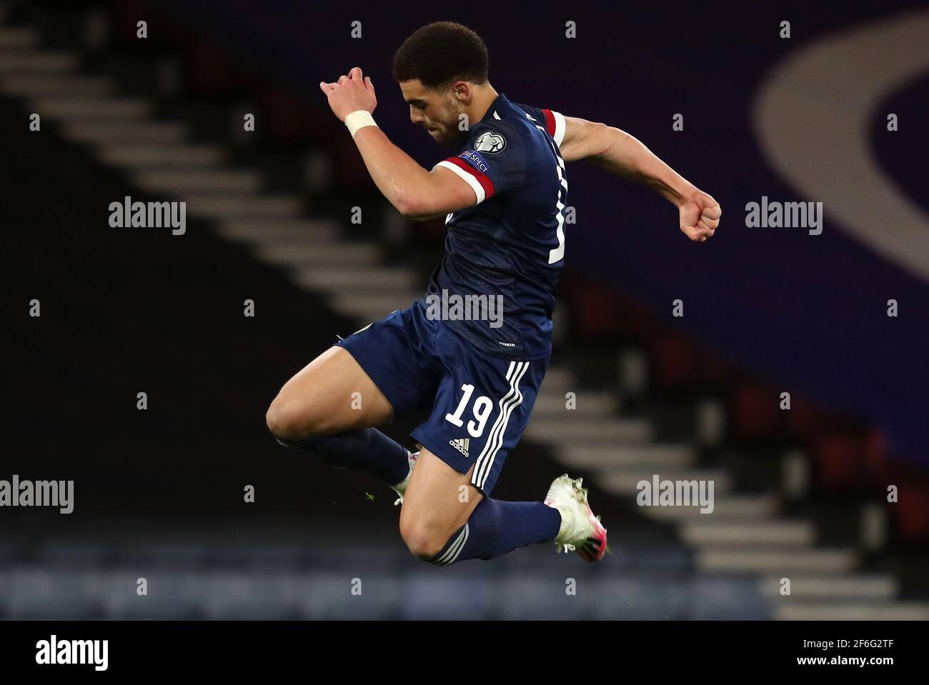 Scotland's Che Adams celebrates scoring their side's third goal of the ...