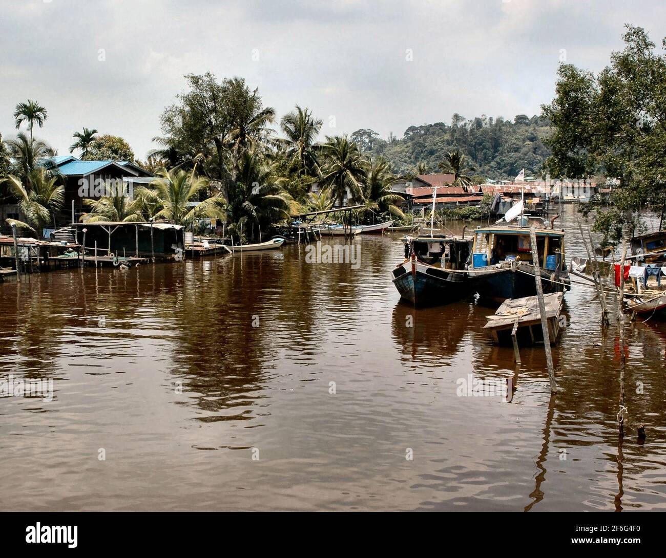 Fishing village scene in Bintulu river Sarawak Borneo Stock Photo - Alamy
