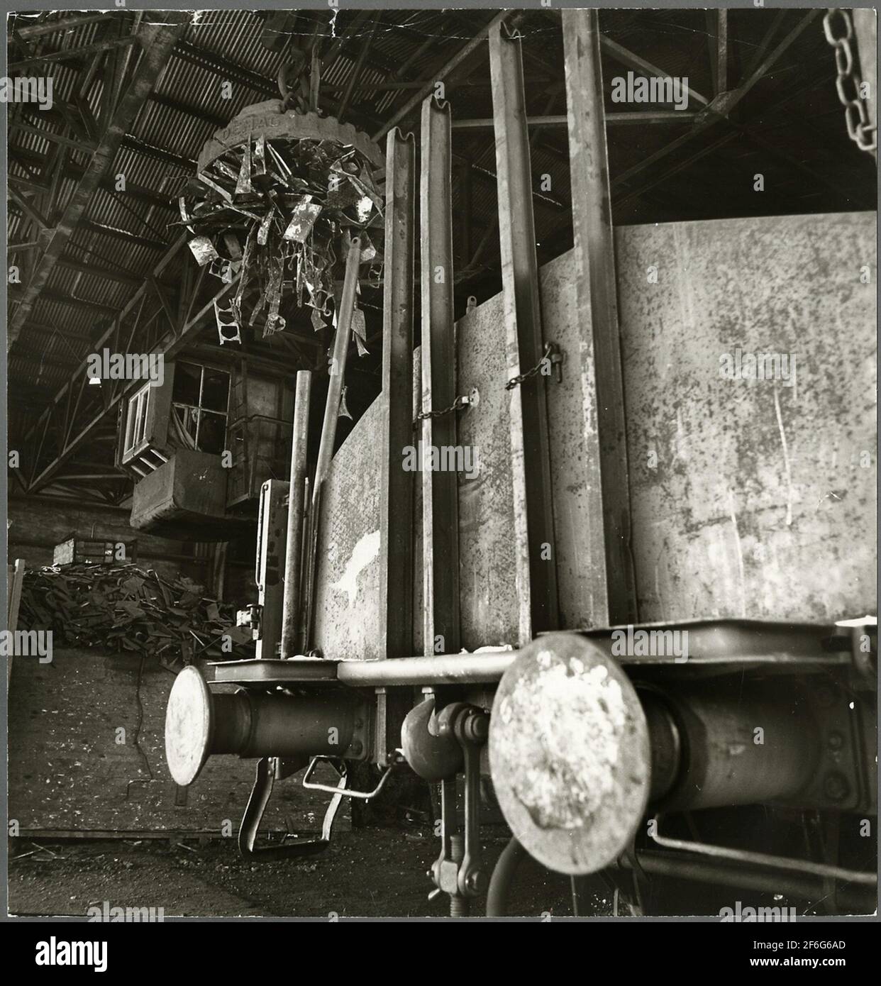 Unloading of iron scrap at AB iron processing Stock Photo - Alamy