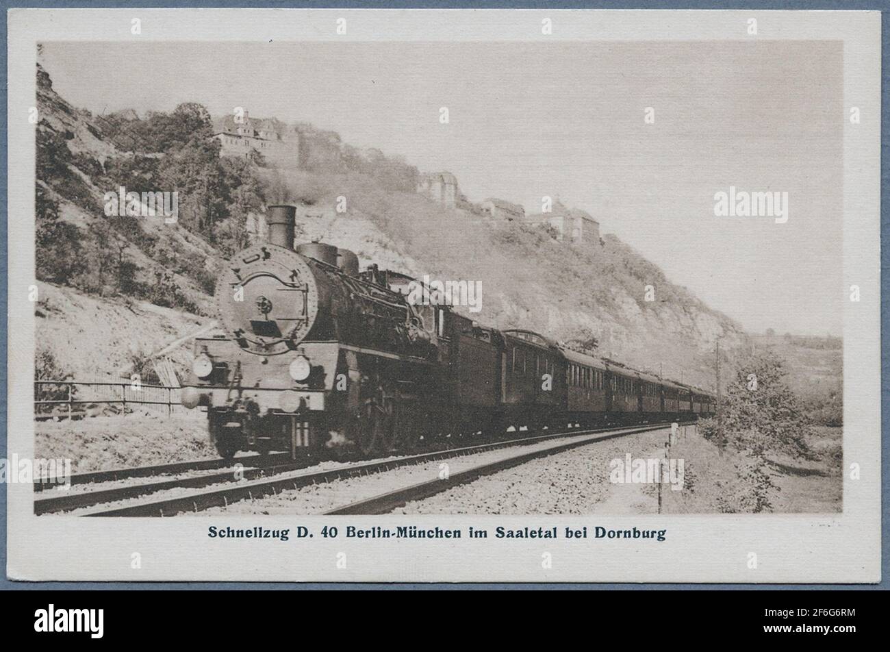 German passenger train with Expressurlok on the track between Dornburg ...
