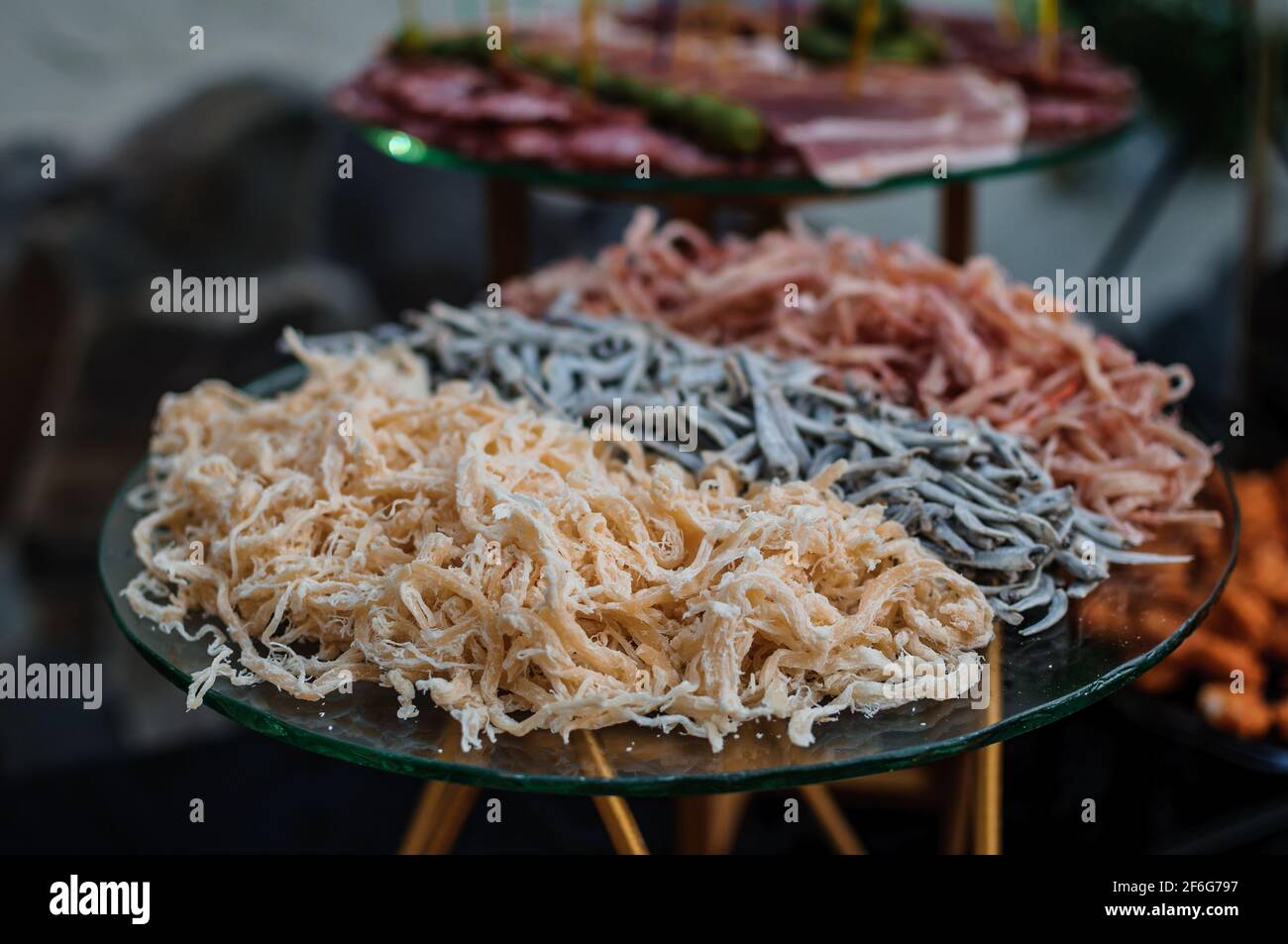 Dried fish and squid, beer snack Stock Photo - Alamy