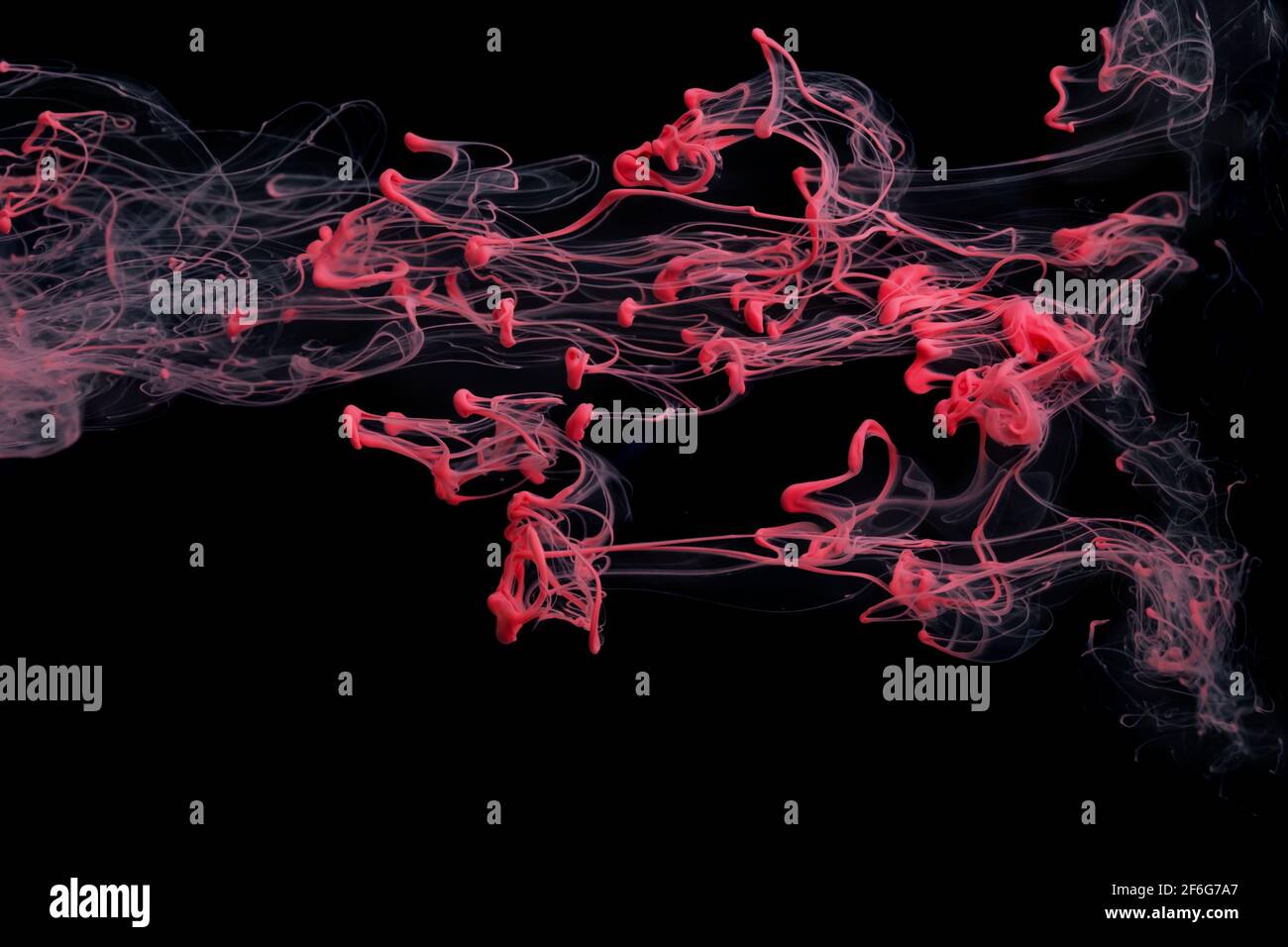 Red color ink paint abstract pattern in water liquid Stock Photo - Alamy