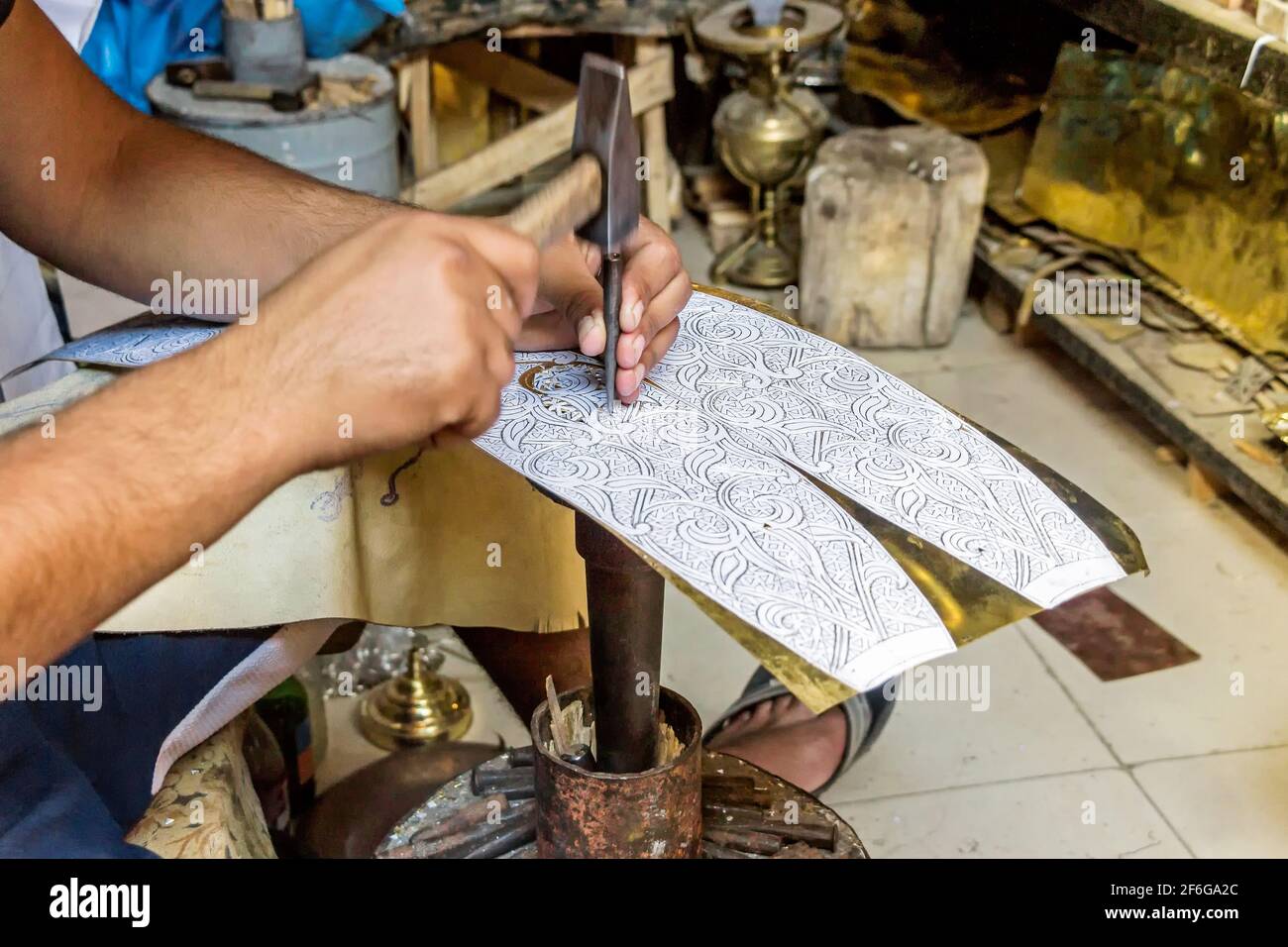 metalwork craftsman making lamp at workshop in Morocco Stock Photo - Alamy
