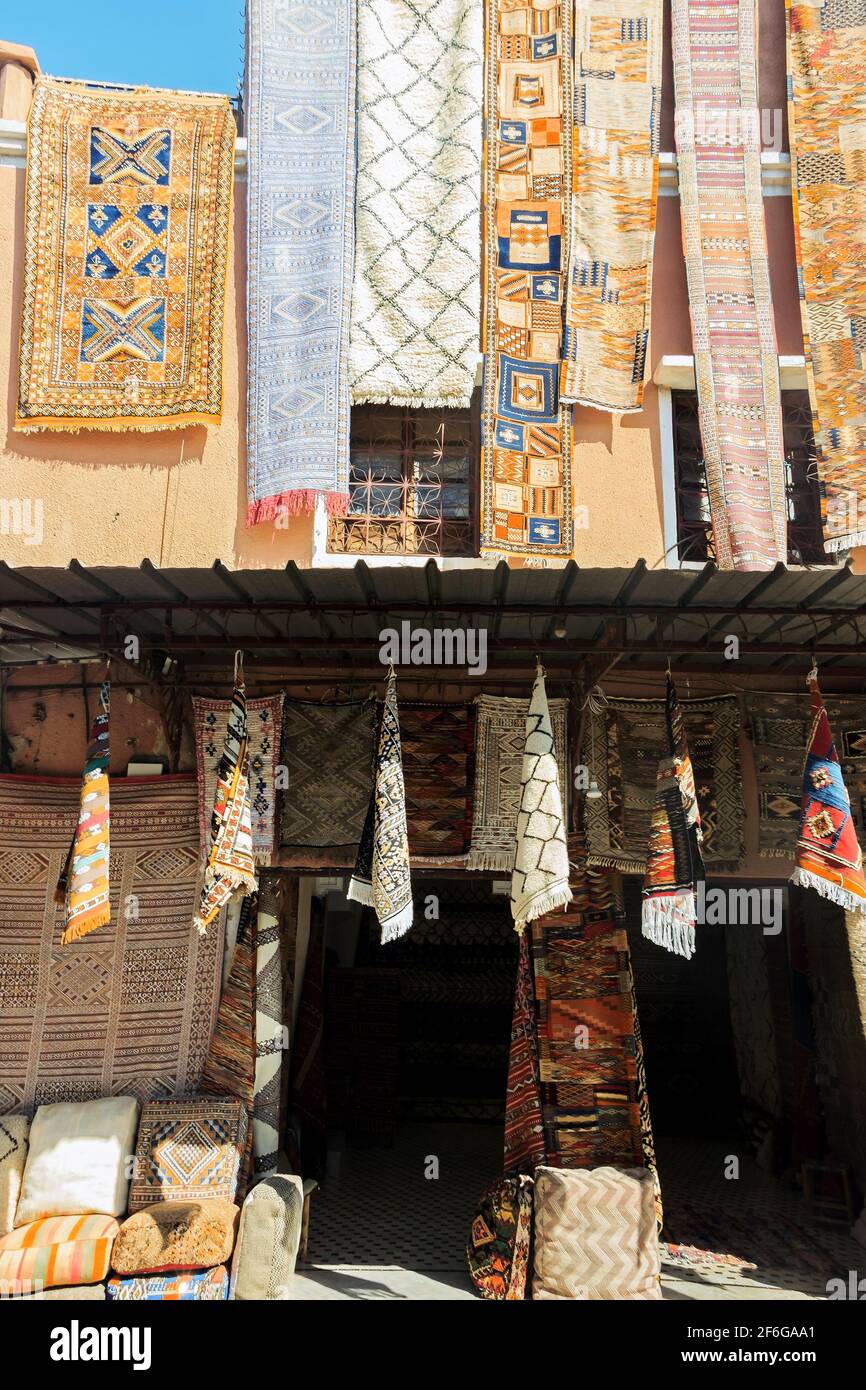 colorful handmade wool rugs at street market in Morocco Stock Photo - Alamy