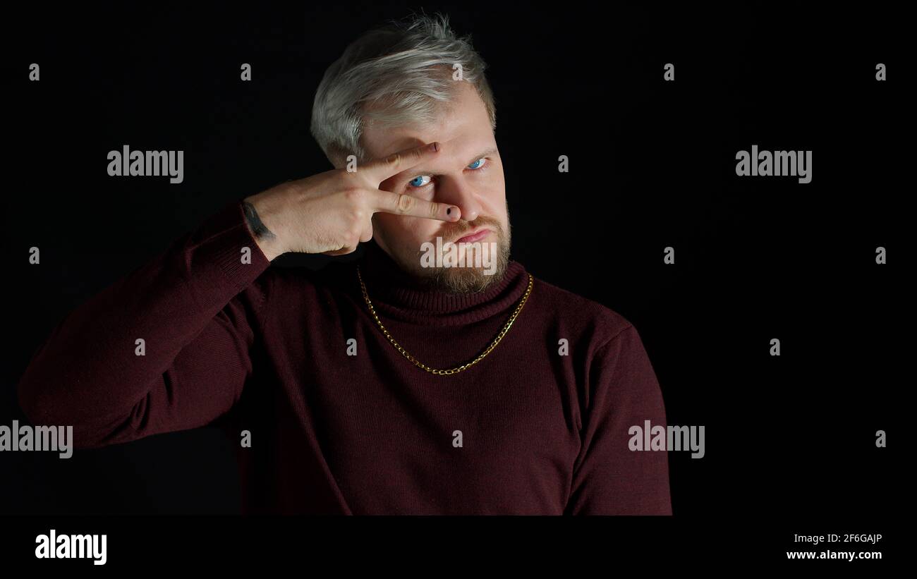 Comical stupid stylish man making funny silly face grimace, playing ...